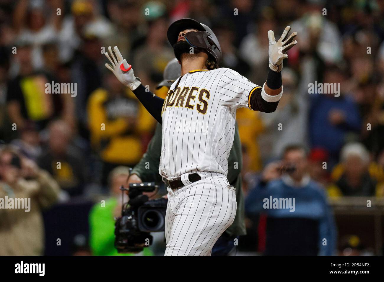 San Diego Padres' Fernando Tatis Jr. gestures at home plate after ...