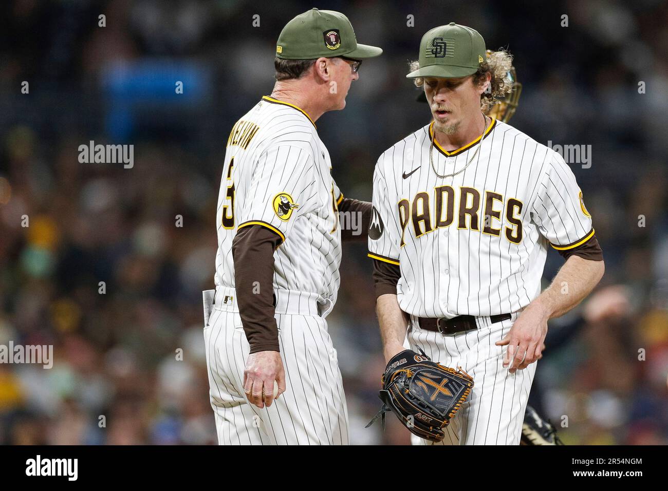 San Diego Padres manager Bob Melvin takes out relief pitcher Tim Hill ...