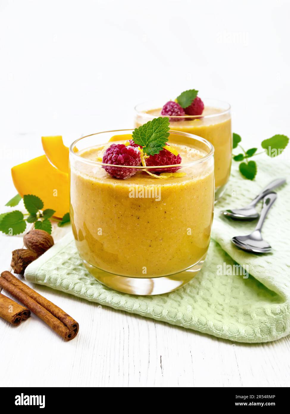 Yogurt, pumpkin and raspberry dessert with nutmeg, cinnamon, orange ...