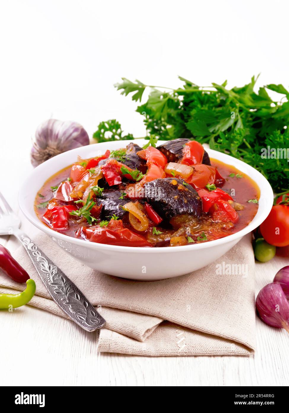Vegetable ragout with eggplant, tomatoes, bell peppers, onions and ...
