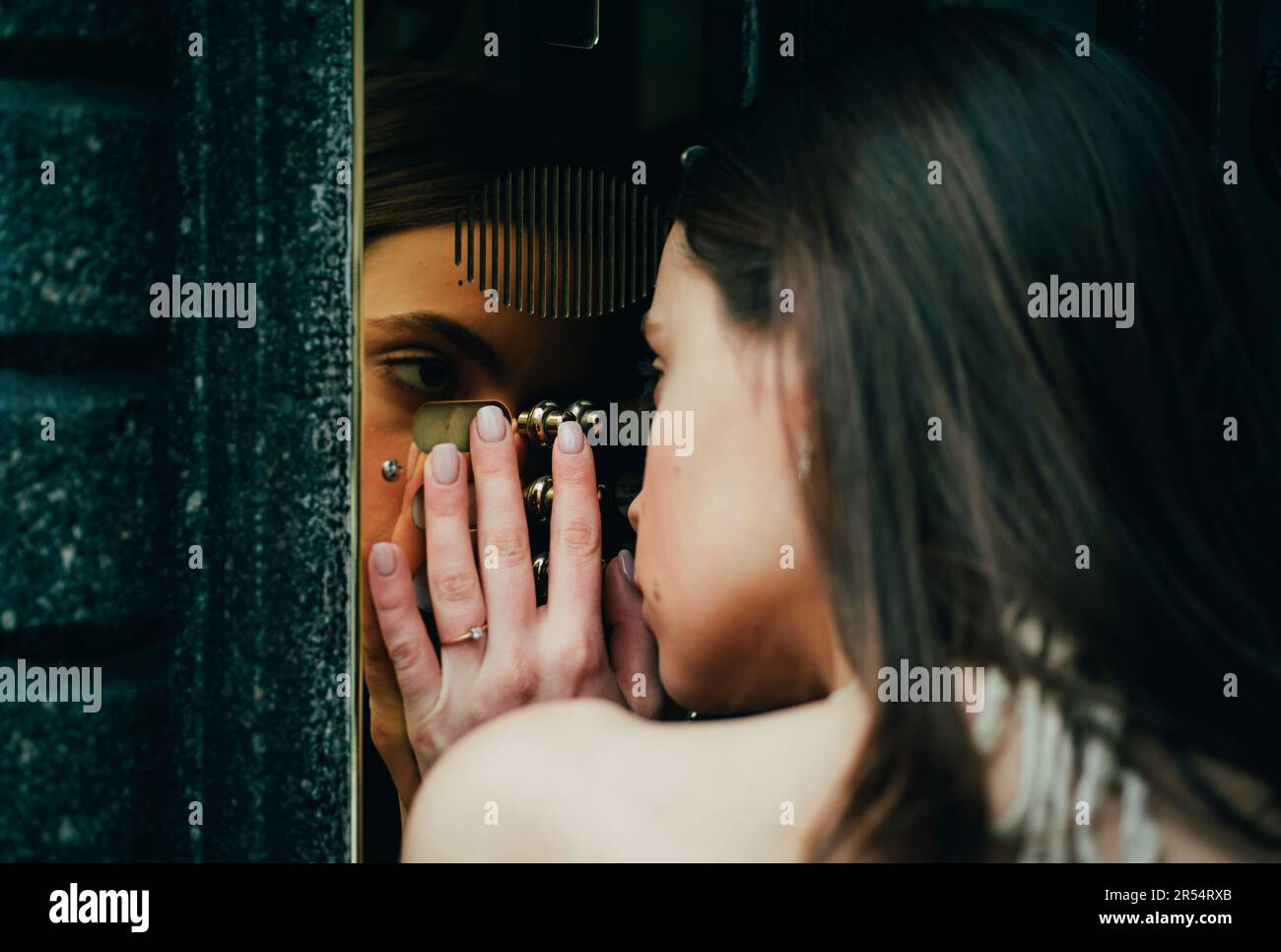 Woman intercom button. Lady girl doorbell at building entrance. Young ...