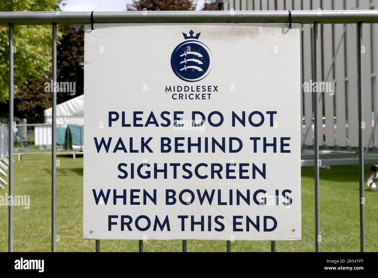 Please do not walk behind the sightscreen sign during Middlesex vs ...