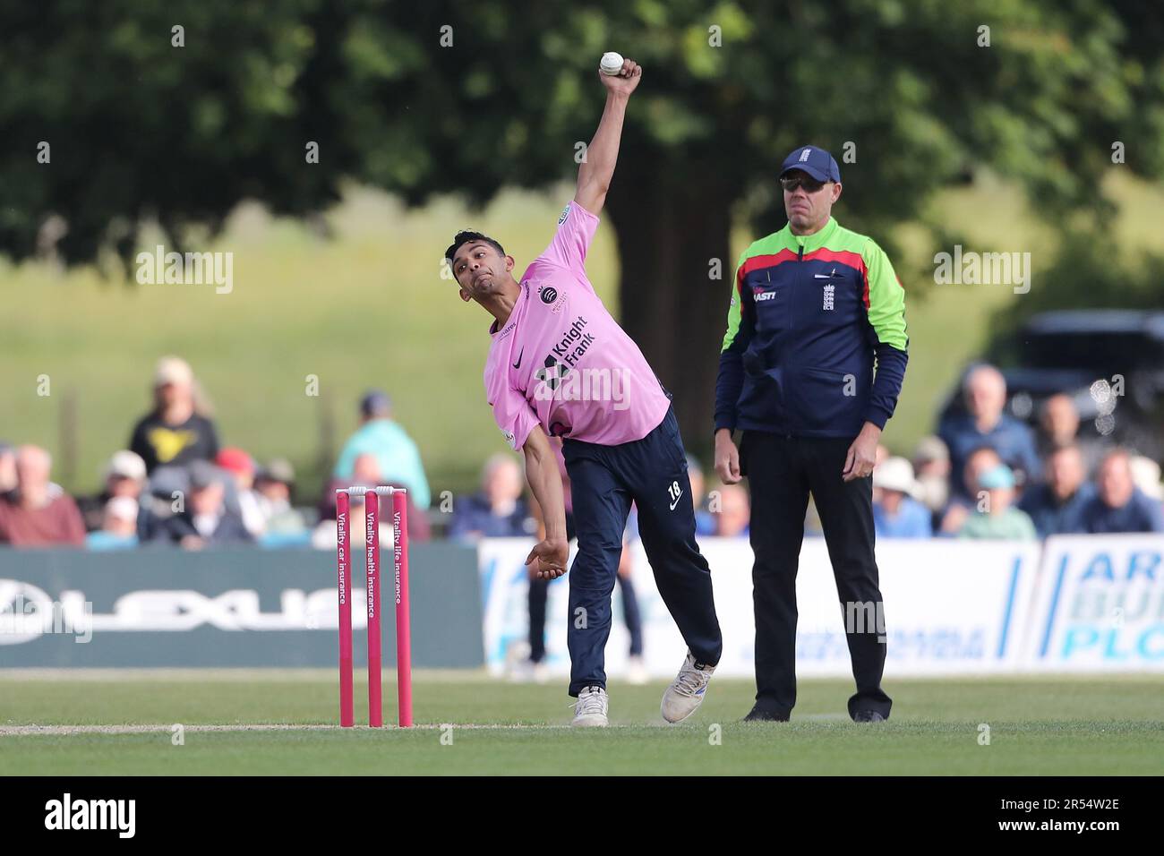 Nathan Fernades in bowling action for Middlesex during Middlesex vs ...