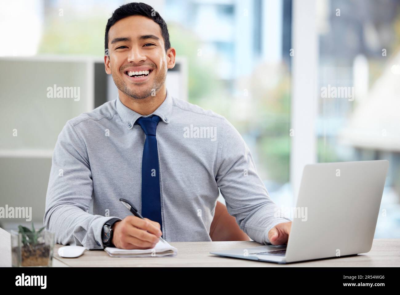 Portrait, happy businessman and working in office or writing in ...