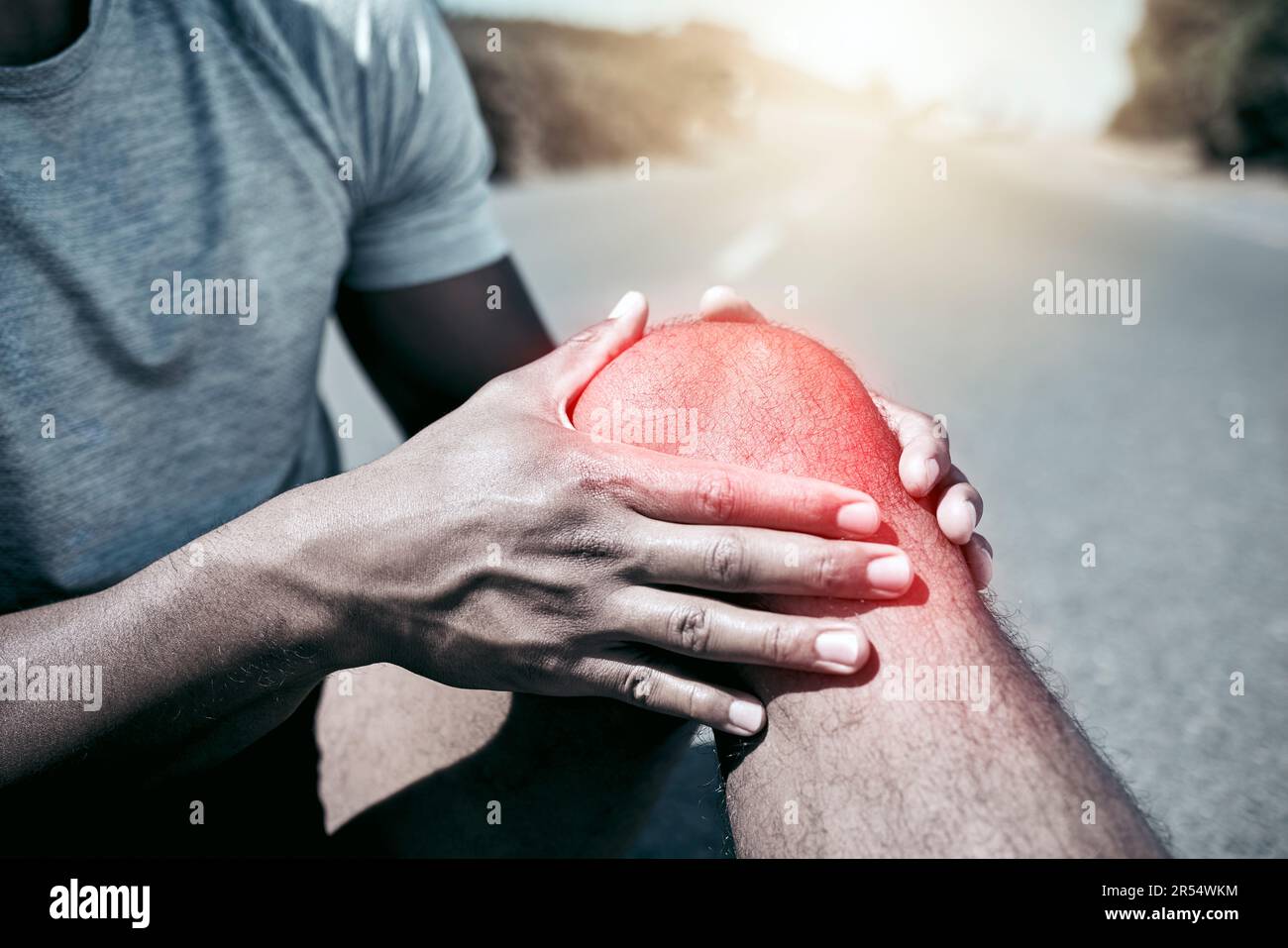Knee injury, road and hurt man in closeup after exercise with training ...