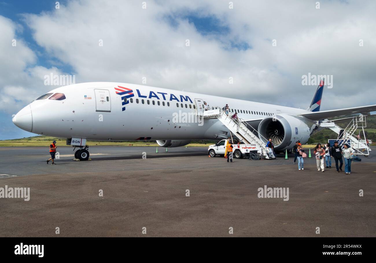 Tourists exiting LATAM Boeing 747 Aircraft and walking the tarmac to ...