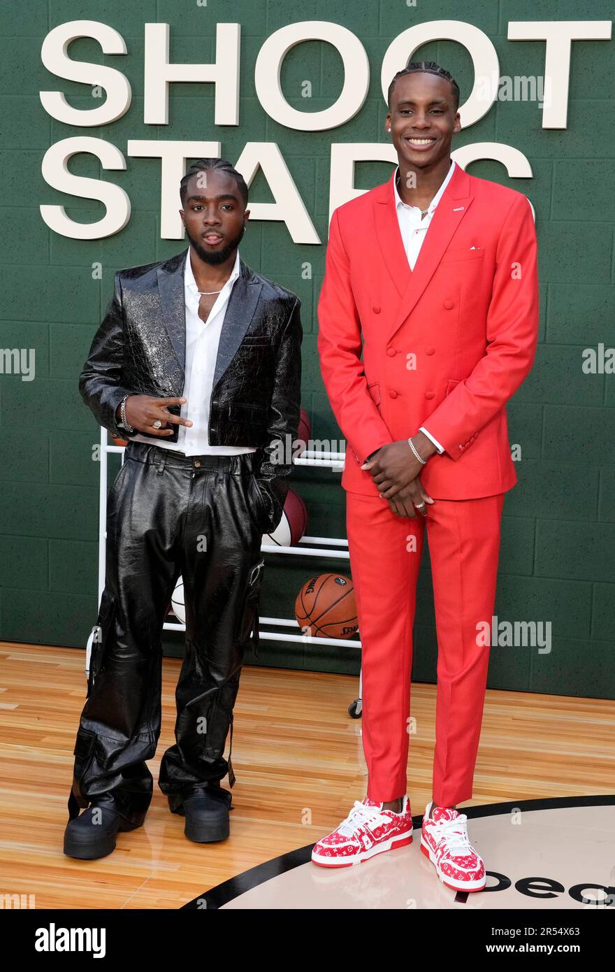 Caleb McLaughlin, left, and Marquis "Mookie" Cook pose together at the premiere of the Peacock ...