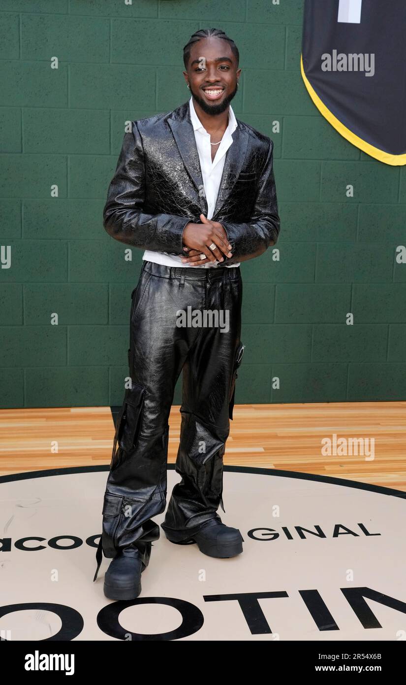 Caleb McLaughlin poses at the premiere of the Peacock film "Shooting ...