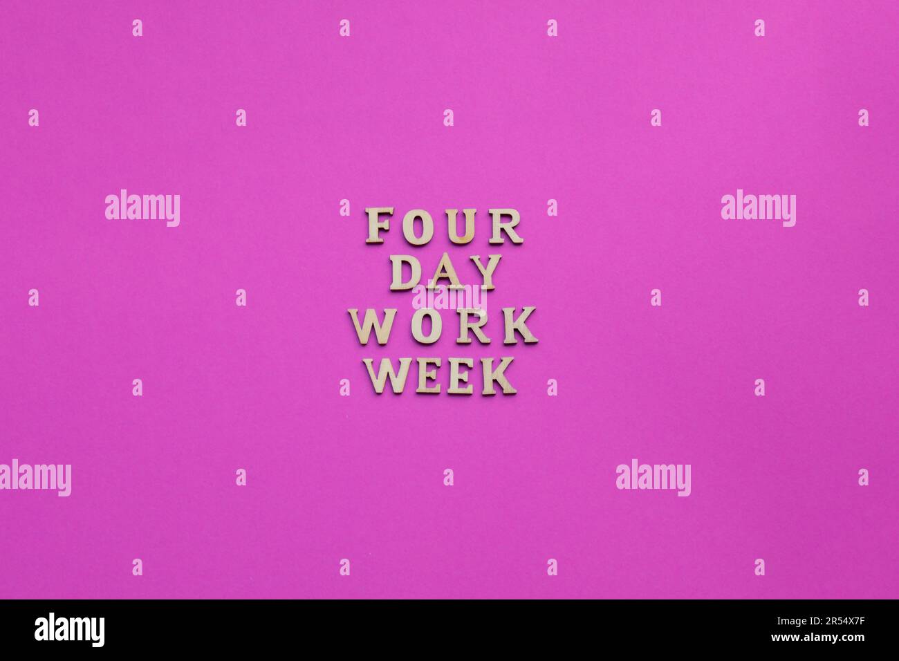 4 day work week symbol wooden letters four day working week concept. Modern approach doing ...