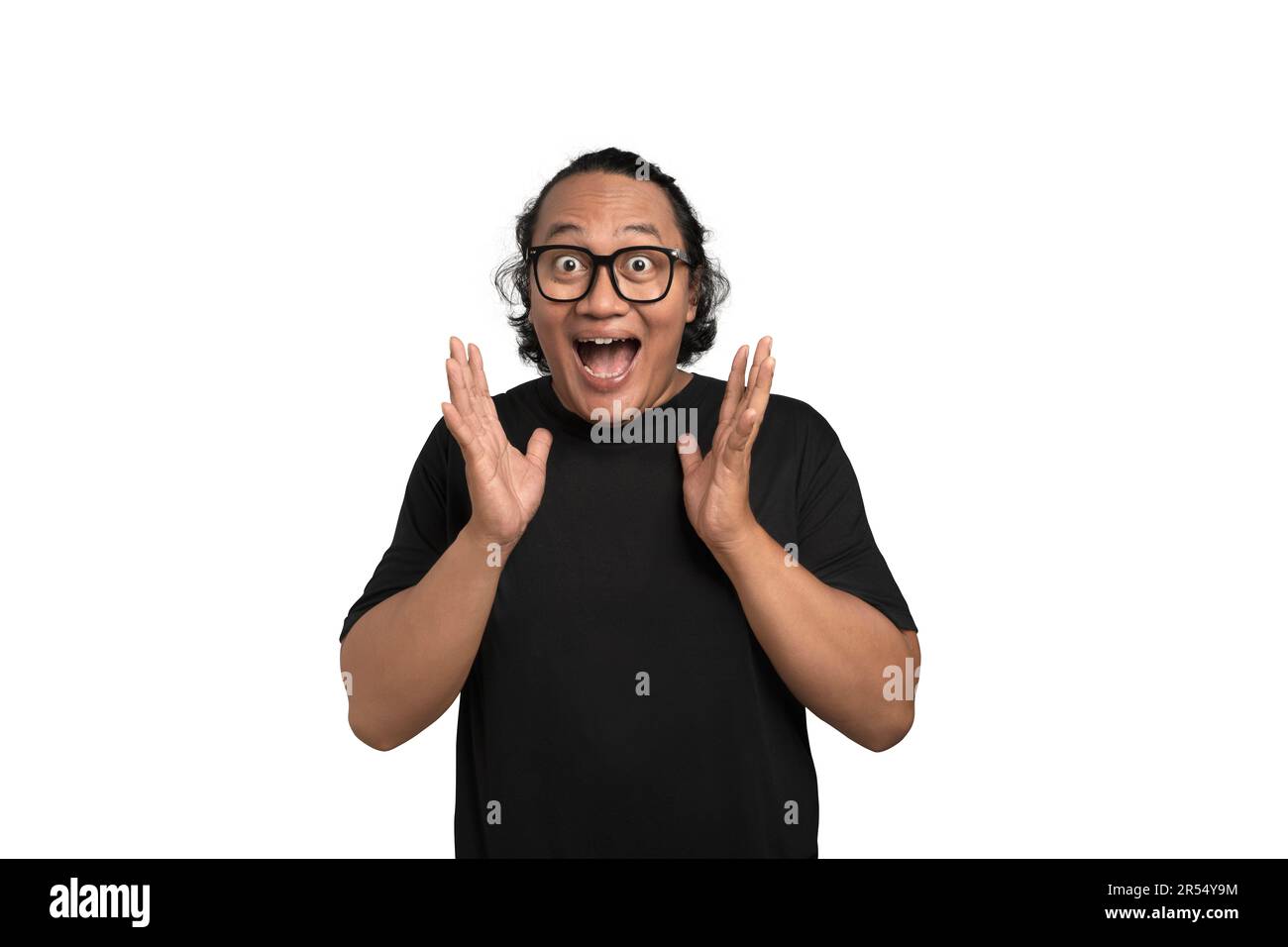 Portrait of an Asian man with an excited facial expression isolated ...