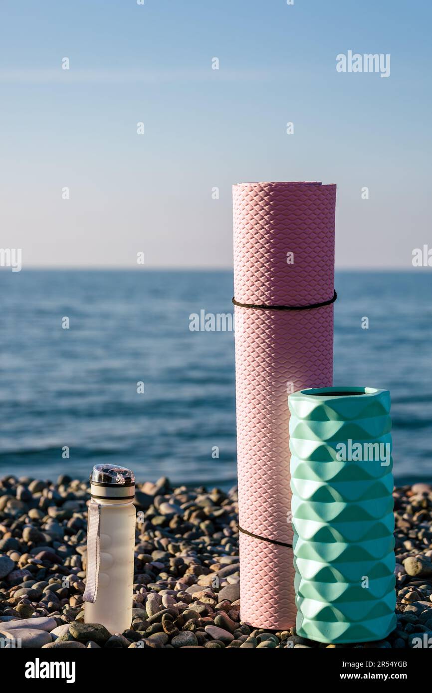 Practicing beach arch yoga pose hi-res stock photography and images - Alamy