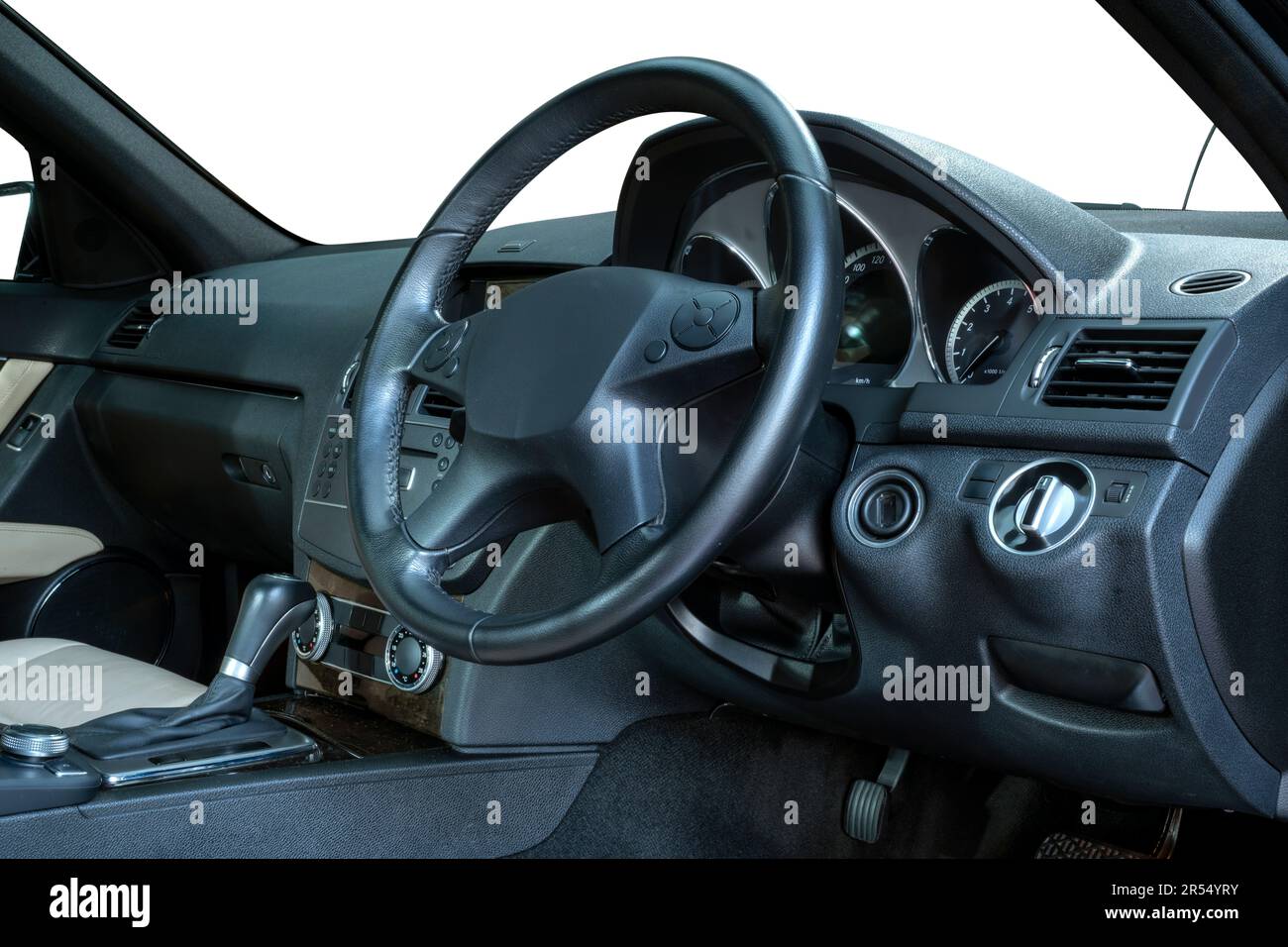 Steering wheel, shift lever, dashboard, speedometer display. Modern car ...