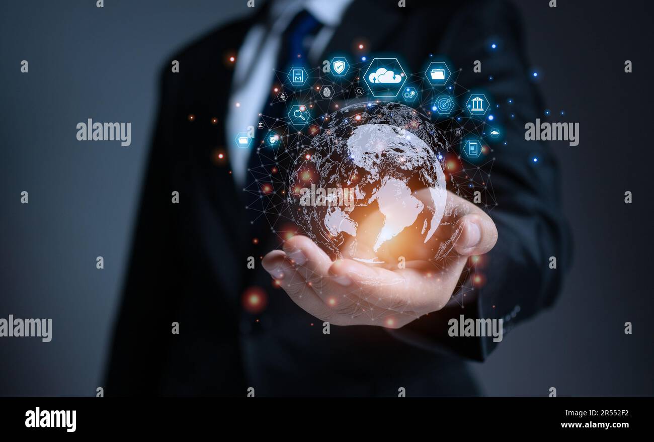 businessman holding globe with virtual Global Internet connection ...