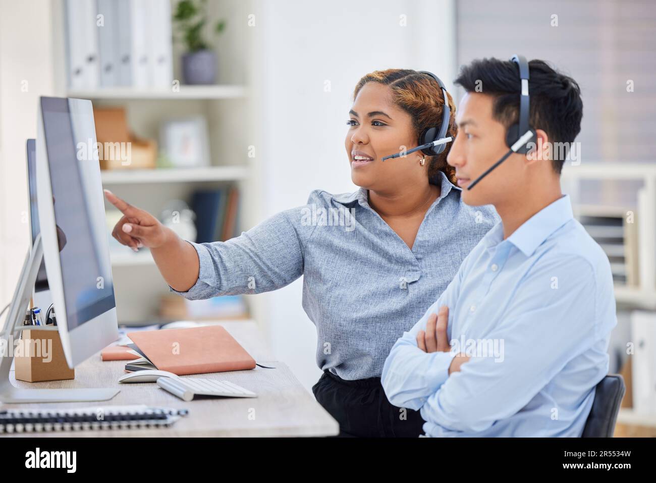 Telemarketing, business woman mentor and contact us talk in a office ...