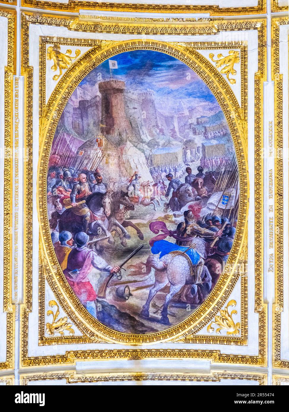 Painted ceiling framed by gilded stucco mouldings and inscriptions ...