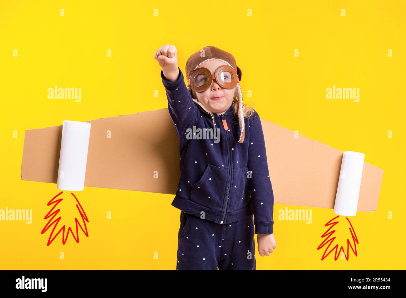Freedom, girl playing to be airplane pilot, funny little girl with ...