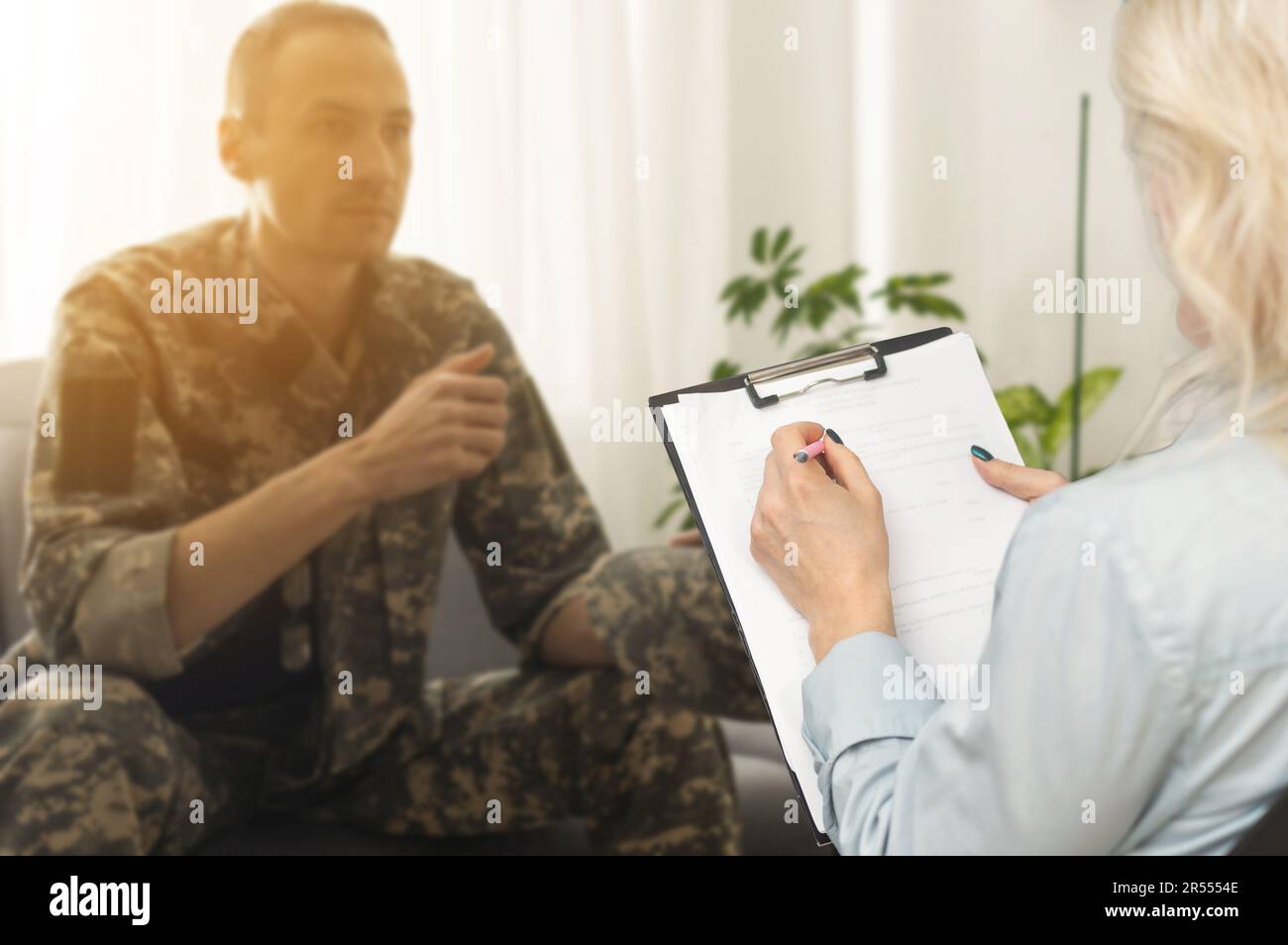 War veteran talking about problems during therapy Stock Photo - Alamy