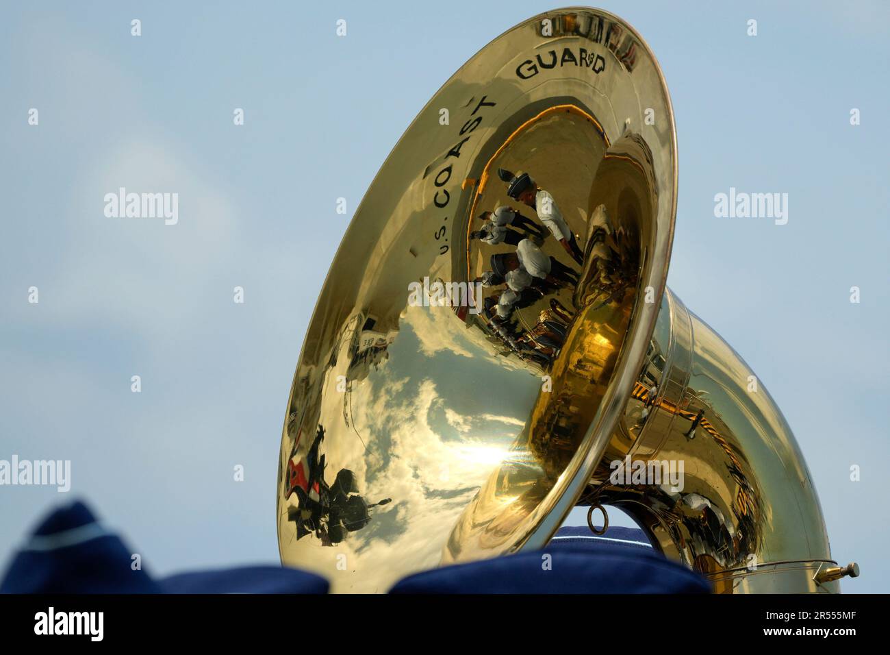 The U.S. Coast Guard Cutter Stratton (WMSL 752) is reflected on a brass ...