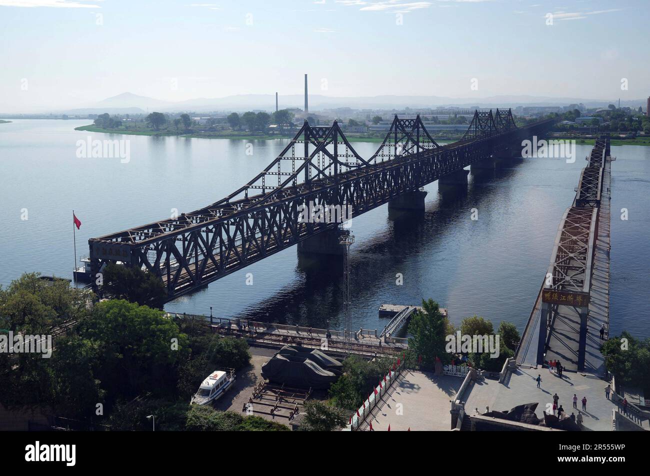 A photo shows Sino-Korean Friendship Bridge (L) and Yalu River Broken ...