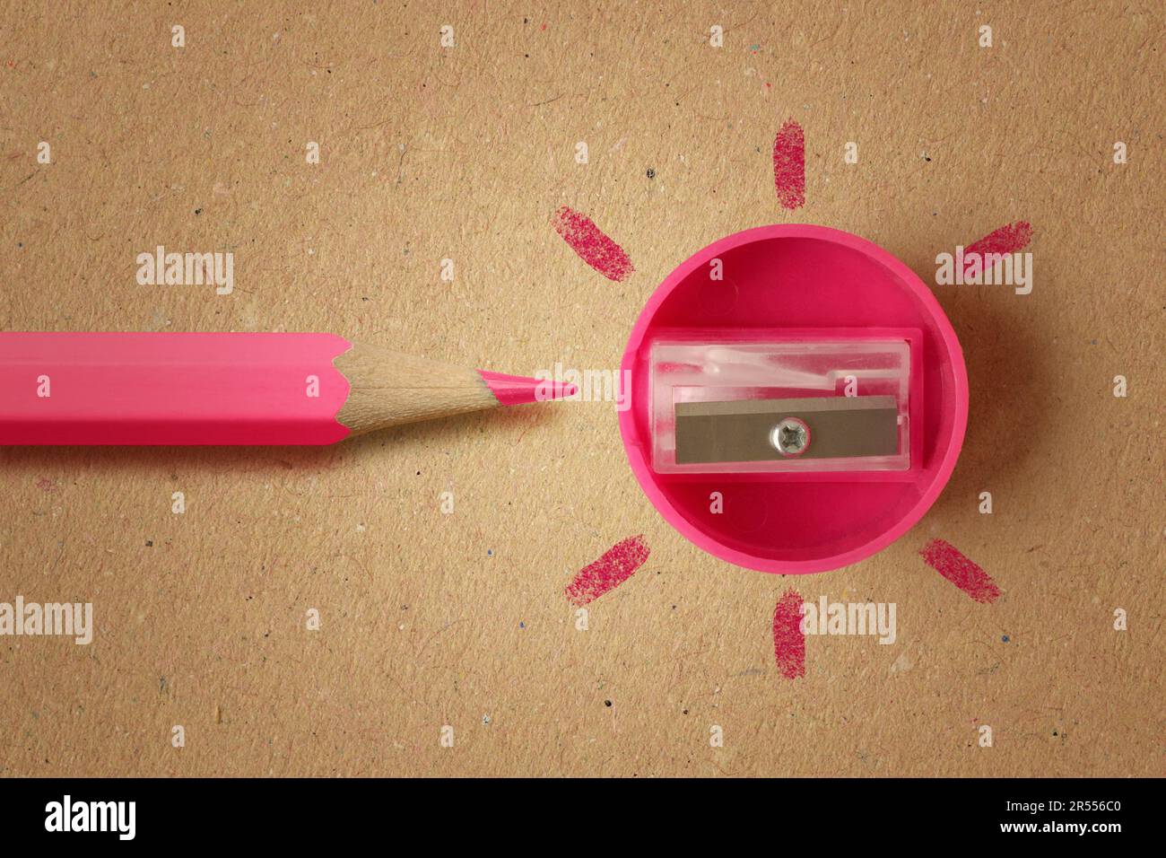 Pink pencil with pink sharpener on recycled paper background - Concept ...