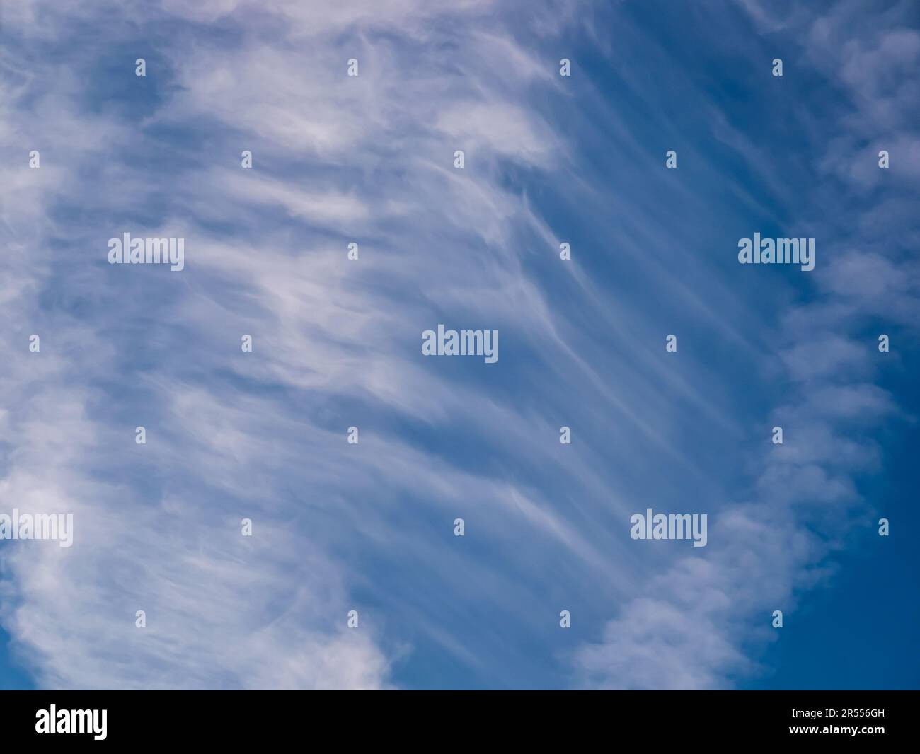 Clouds - cirrus cloud - in the shape of a waterfall in the blue sky ...
