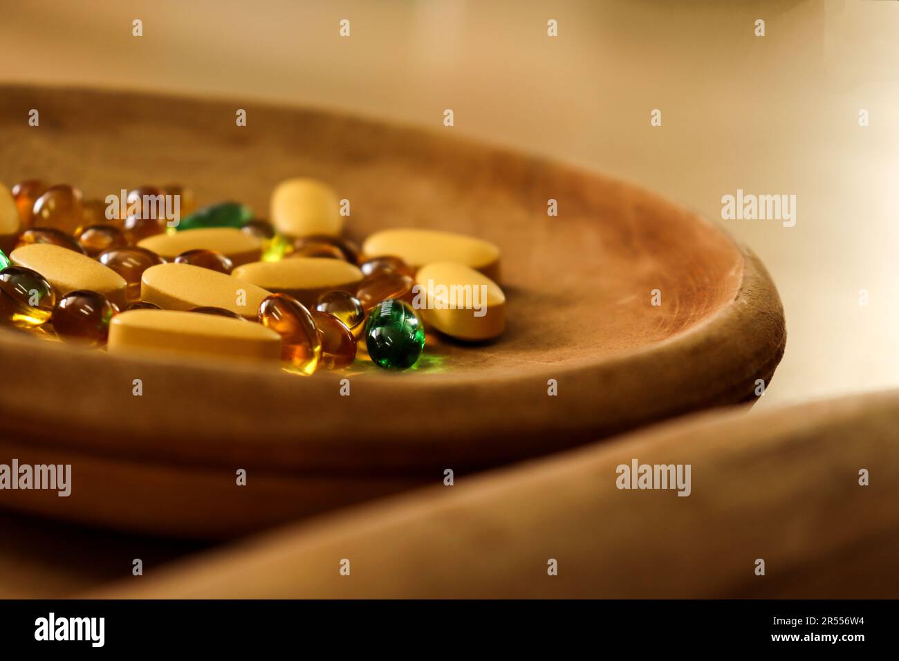 Medicines and Vitamins Tablets on a Brown Clay Plate Stock Photo - Alamy