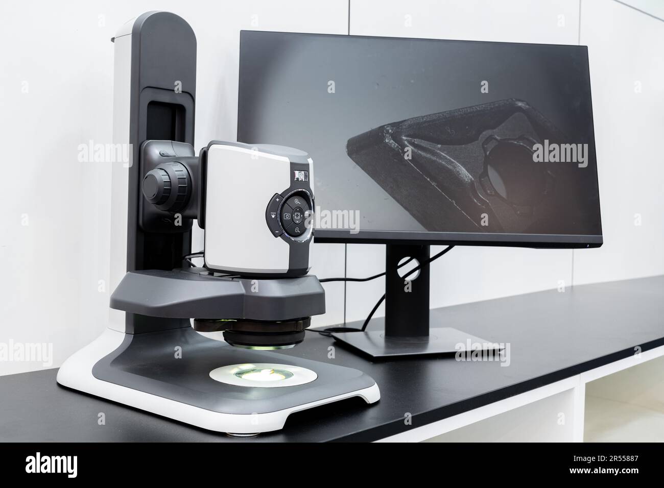 Optic machine for precise measurement of part size and quality ...