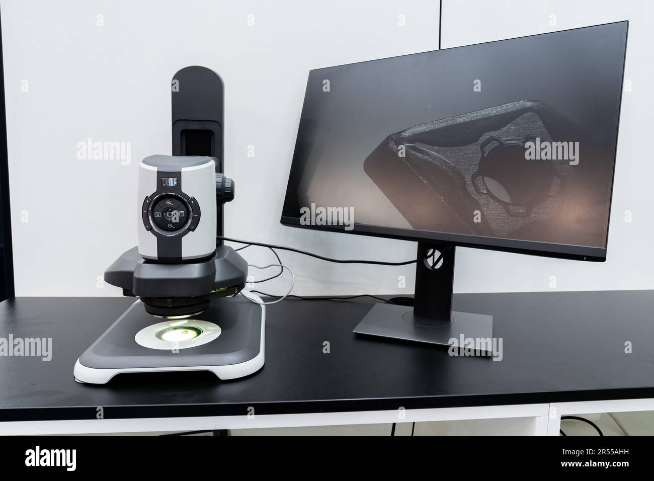 Optic machine for precise measurement of part size and quality ...