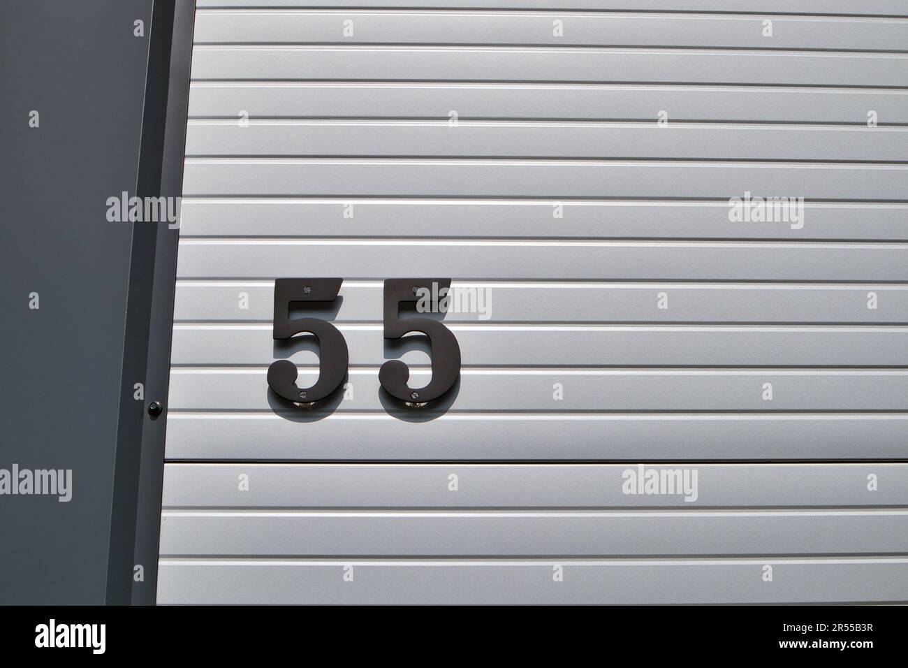 Number 55 on a wall Stock Photo - Alamy