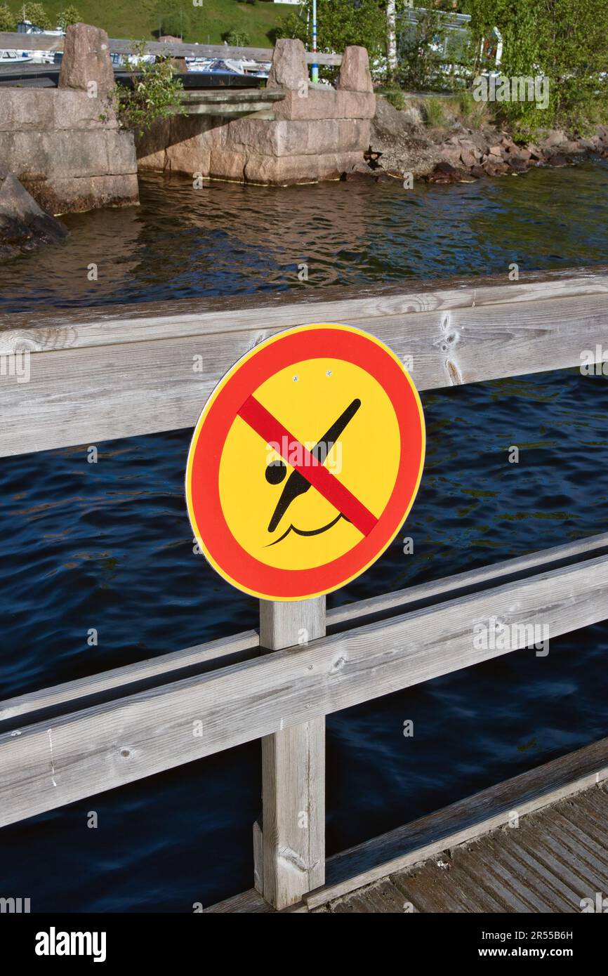 no diving sign on a jetty, Finland Stock Photo - Alamy