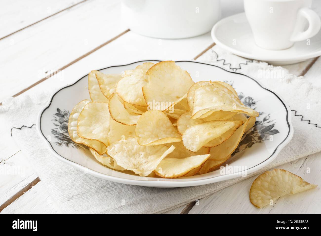 A Malay traditional snack named Kerepek Ubi Putih. This is local Asian ...