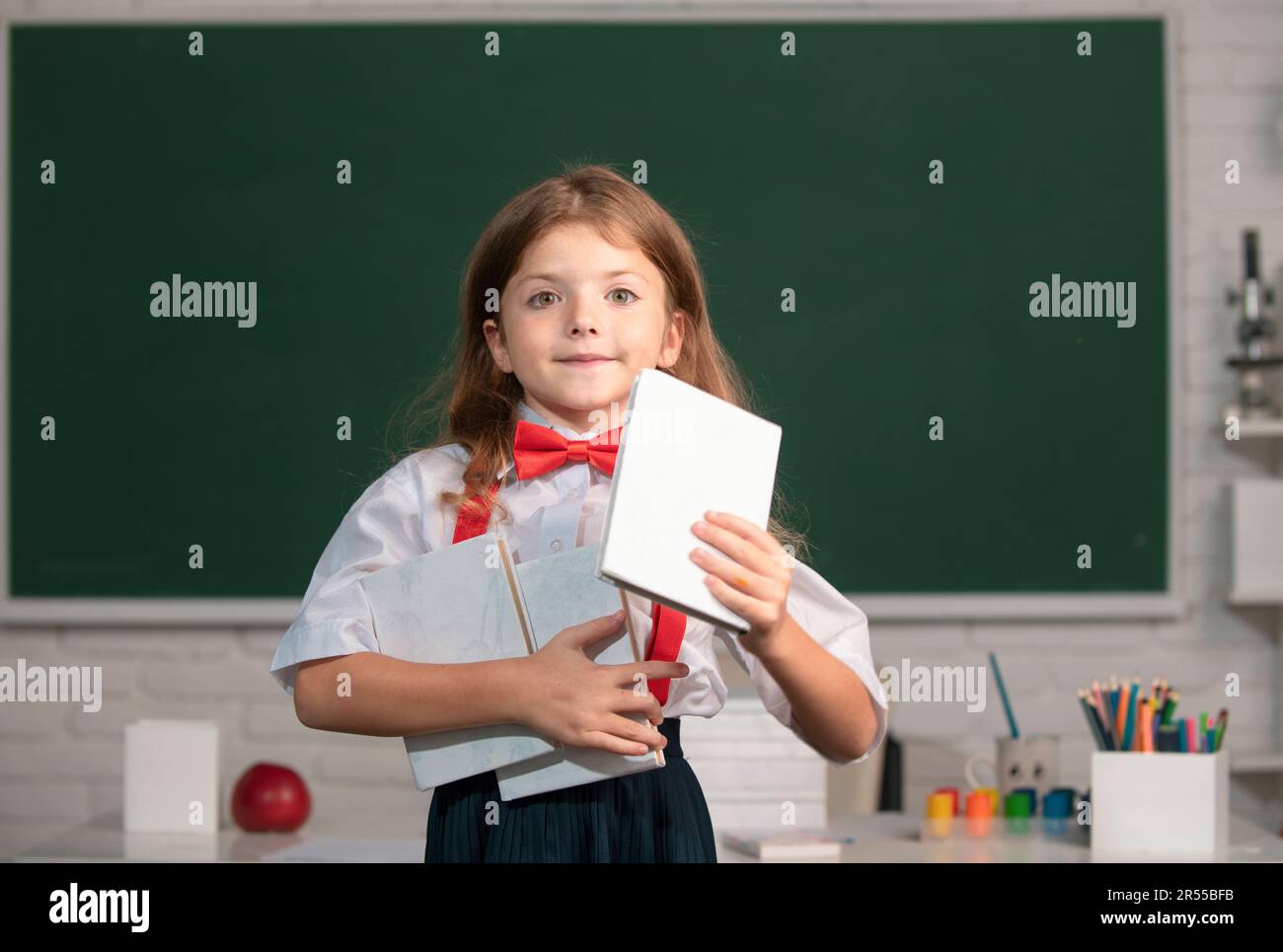 Little school girl student learning in class, study english language at ...