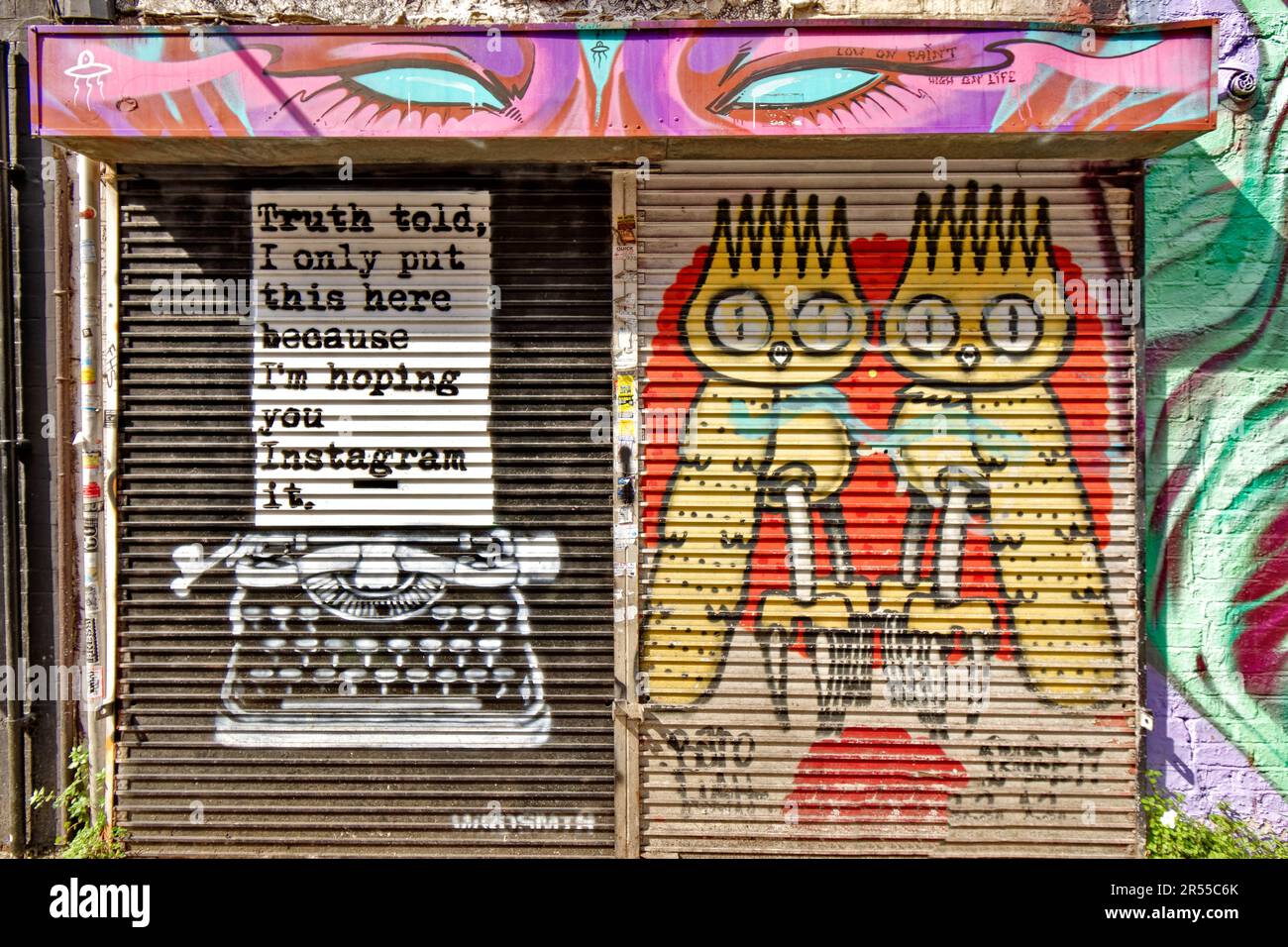 London Brick Lane Tower Hamlets shops cafes restaurants shutters with ...