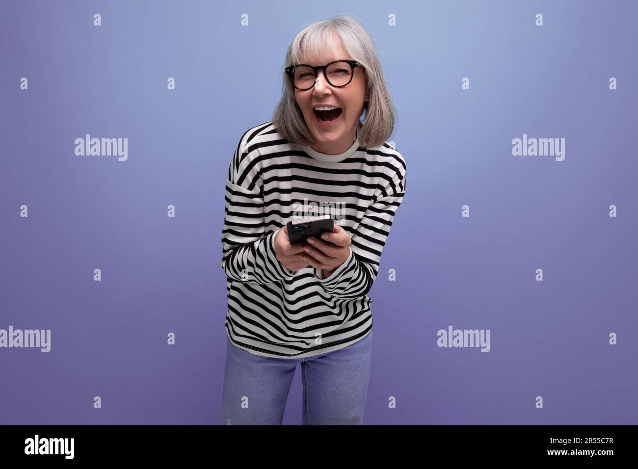 middle aged business woman chatting on internet using smart phone on ...