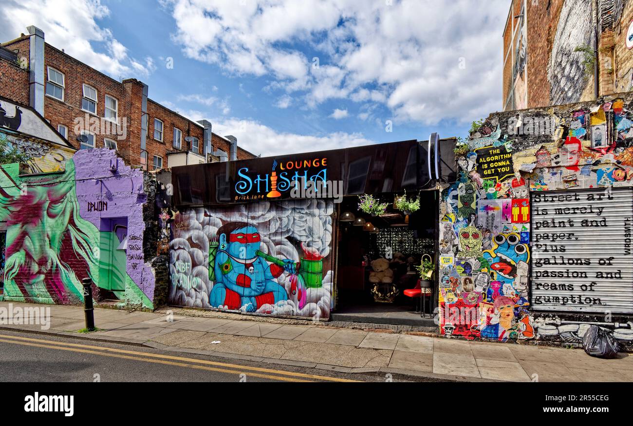 London Brick Lane Tower Hamlets shops cafes restaurants wall with ...