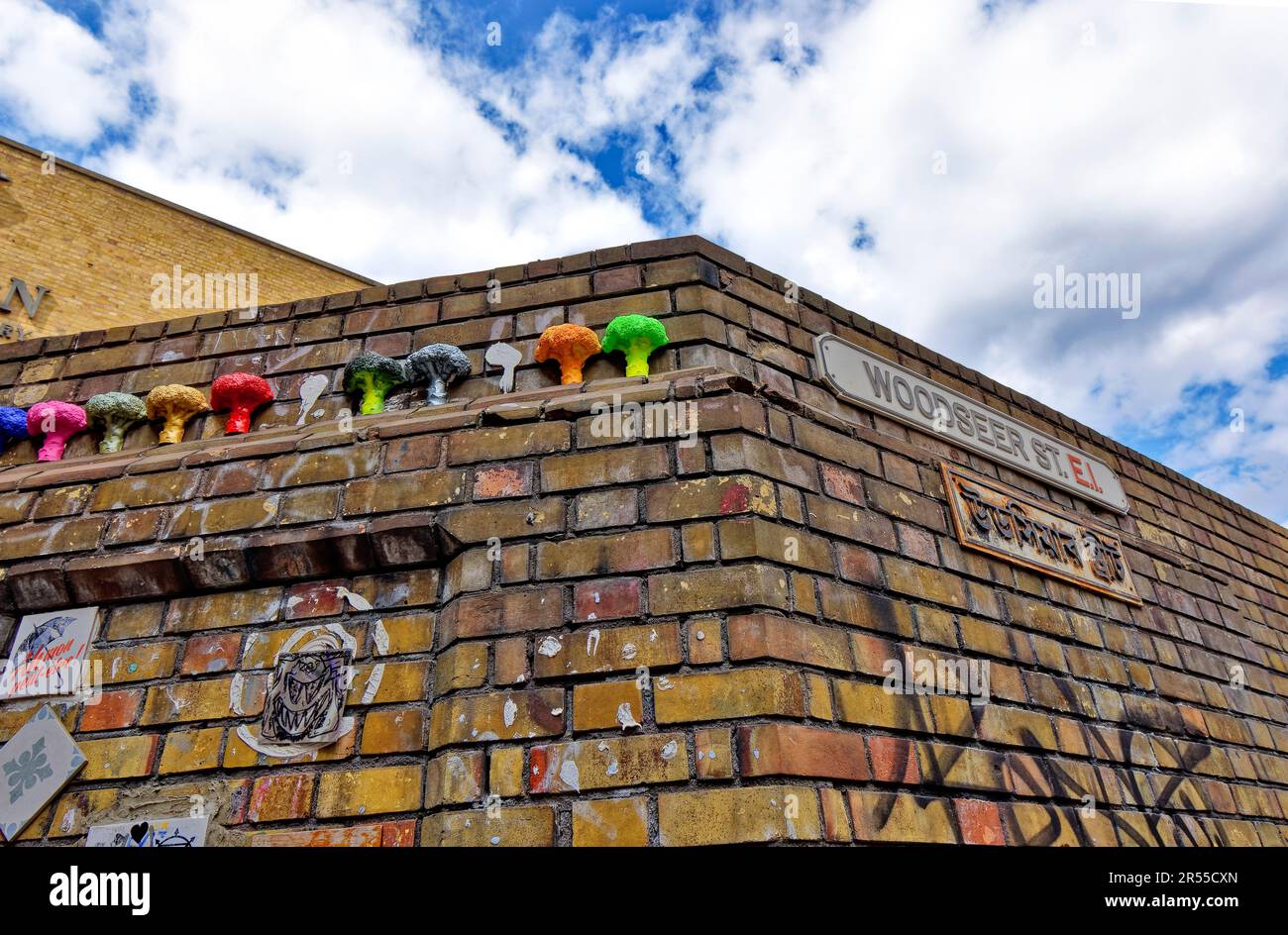 London Brick Lane Tower Hamlets shops cafes restaurants wall with ...