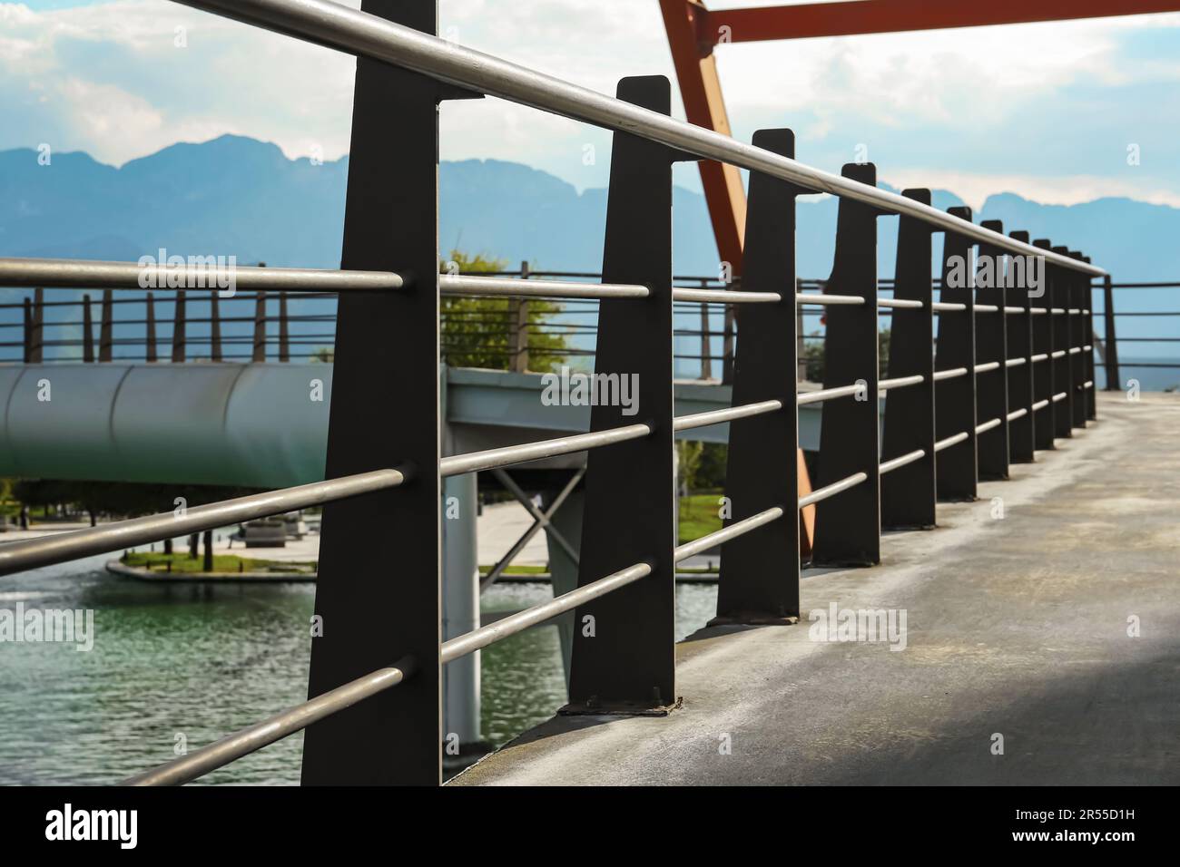 Metal handrails of bridge over canal outdoors Stock Photo - Alamy