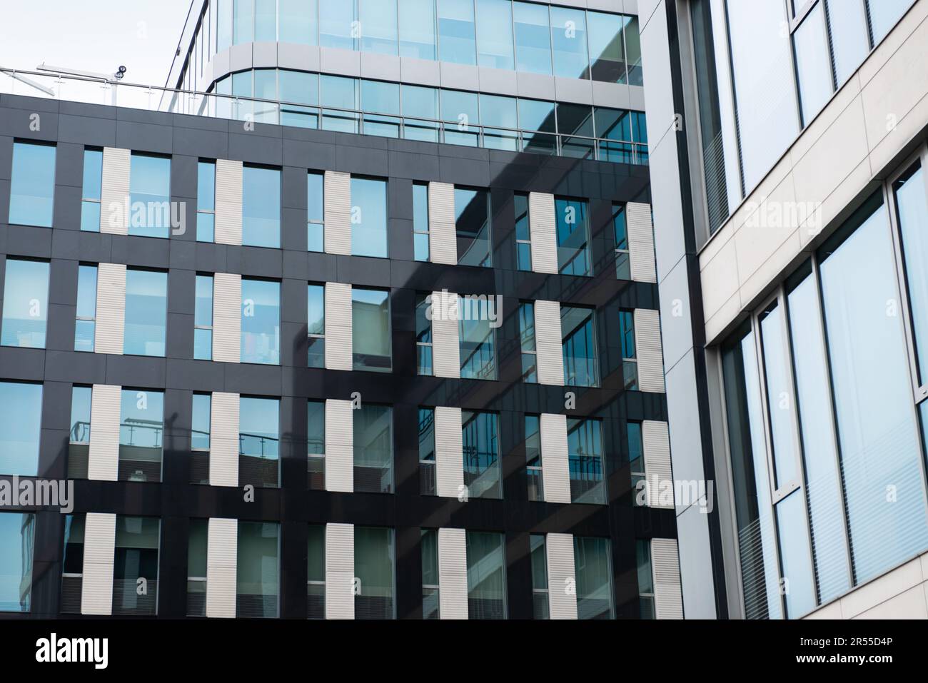 Exterior of modern building with large windows Stock Photo - Alamy