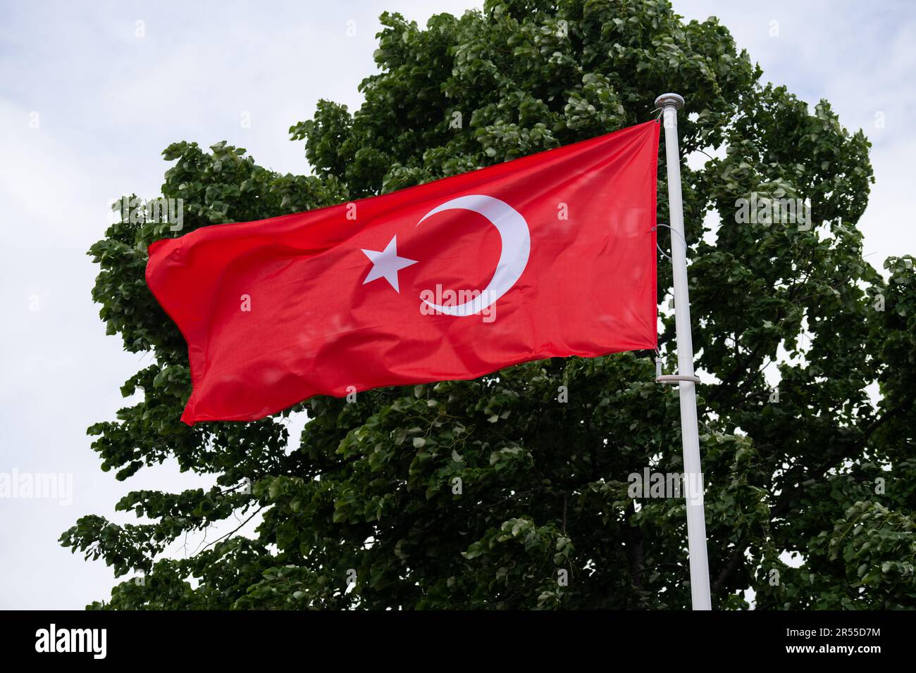 The Turkish flag flutters in the wind. State symbol of Turkey. High ...
