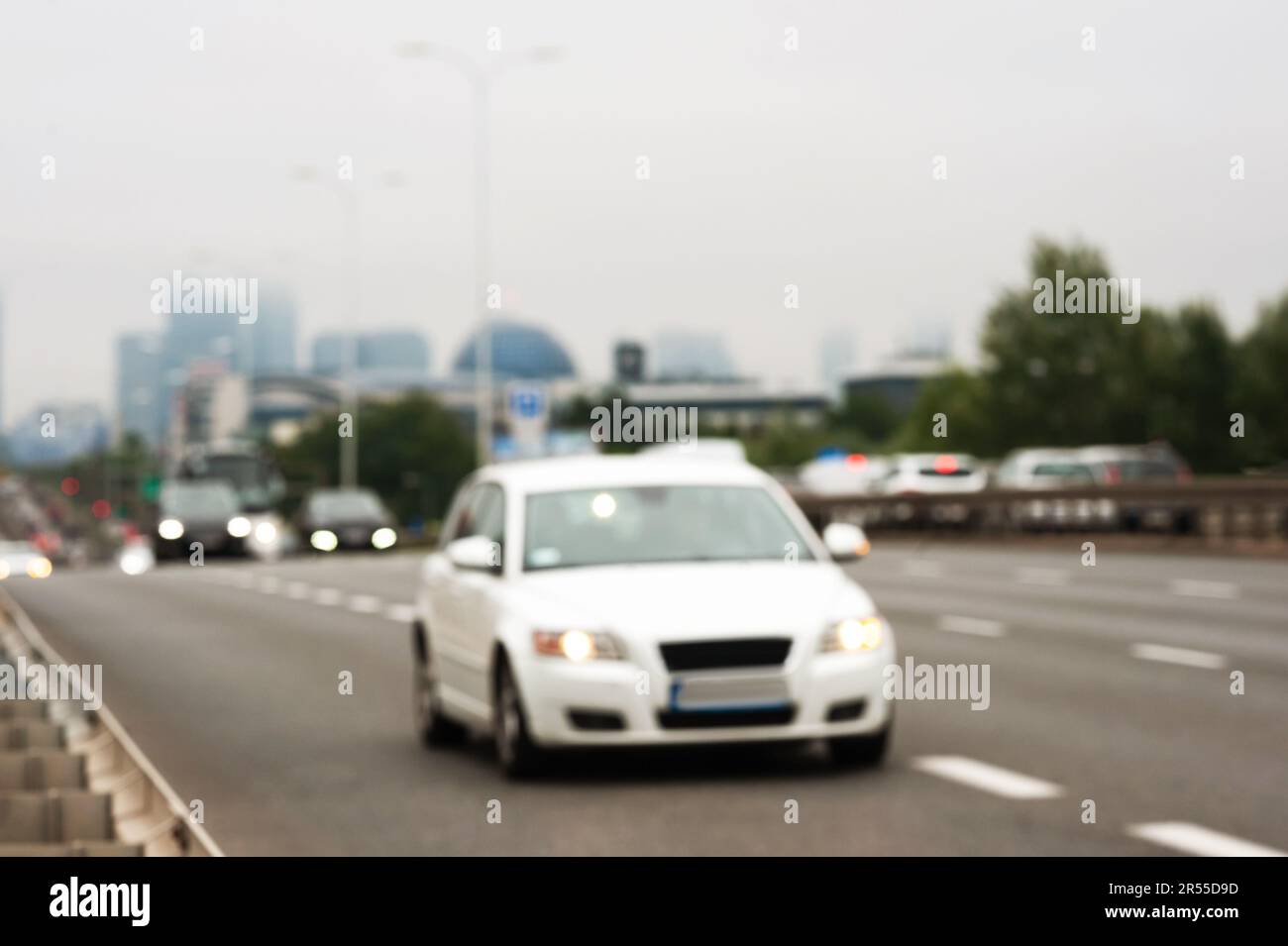 Blurred view of city road with cars Stock Photo - Alamy