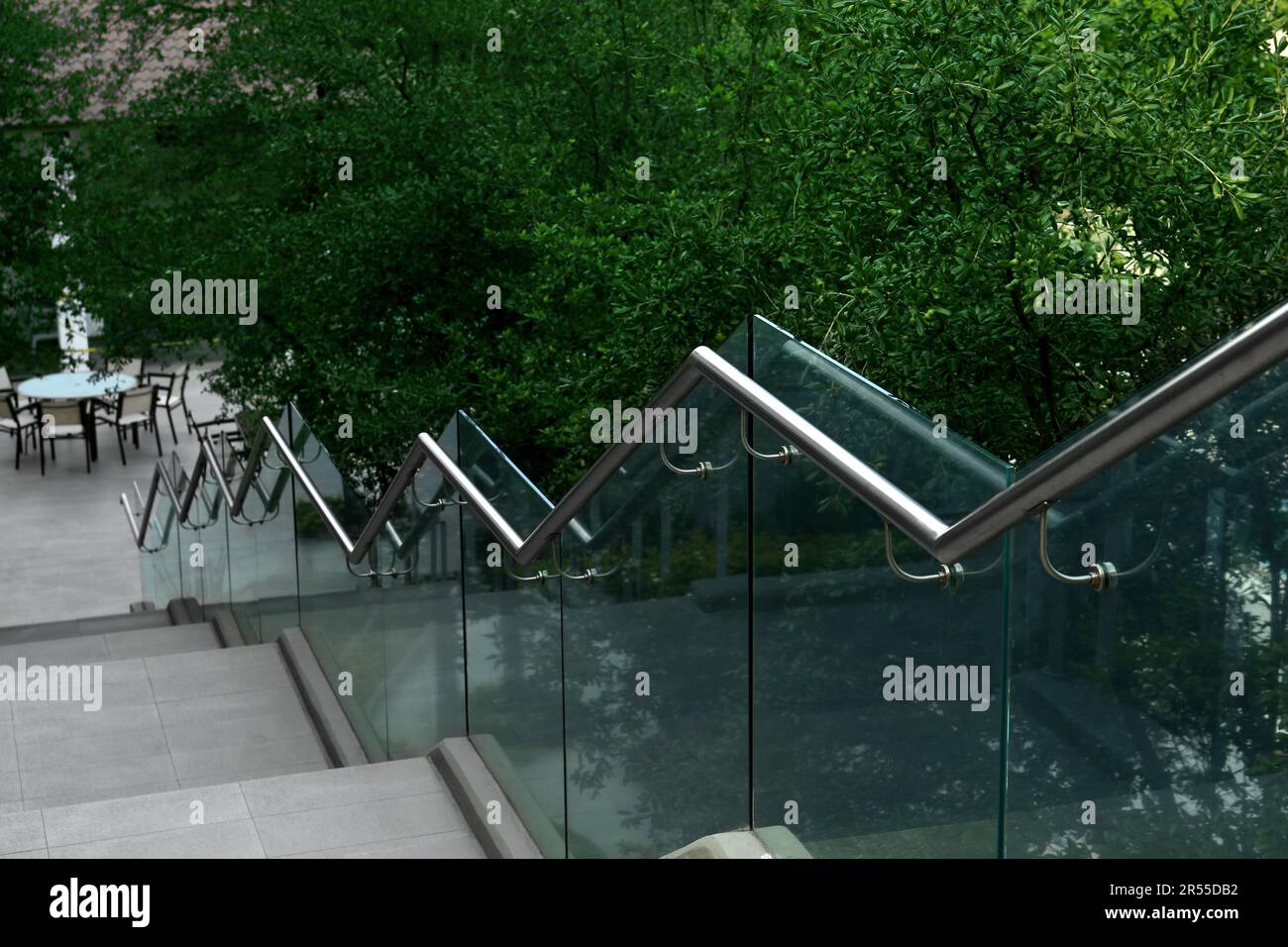 Outdoor staircase with metal handrails in park Stock Photo - Alamy