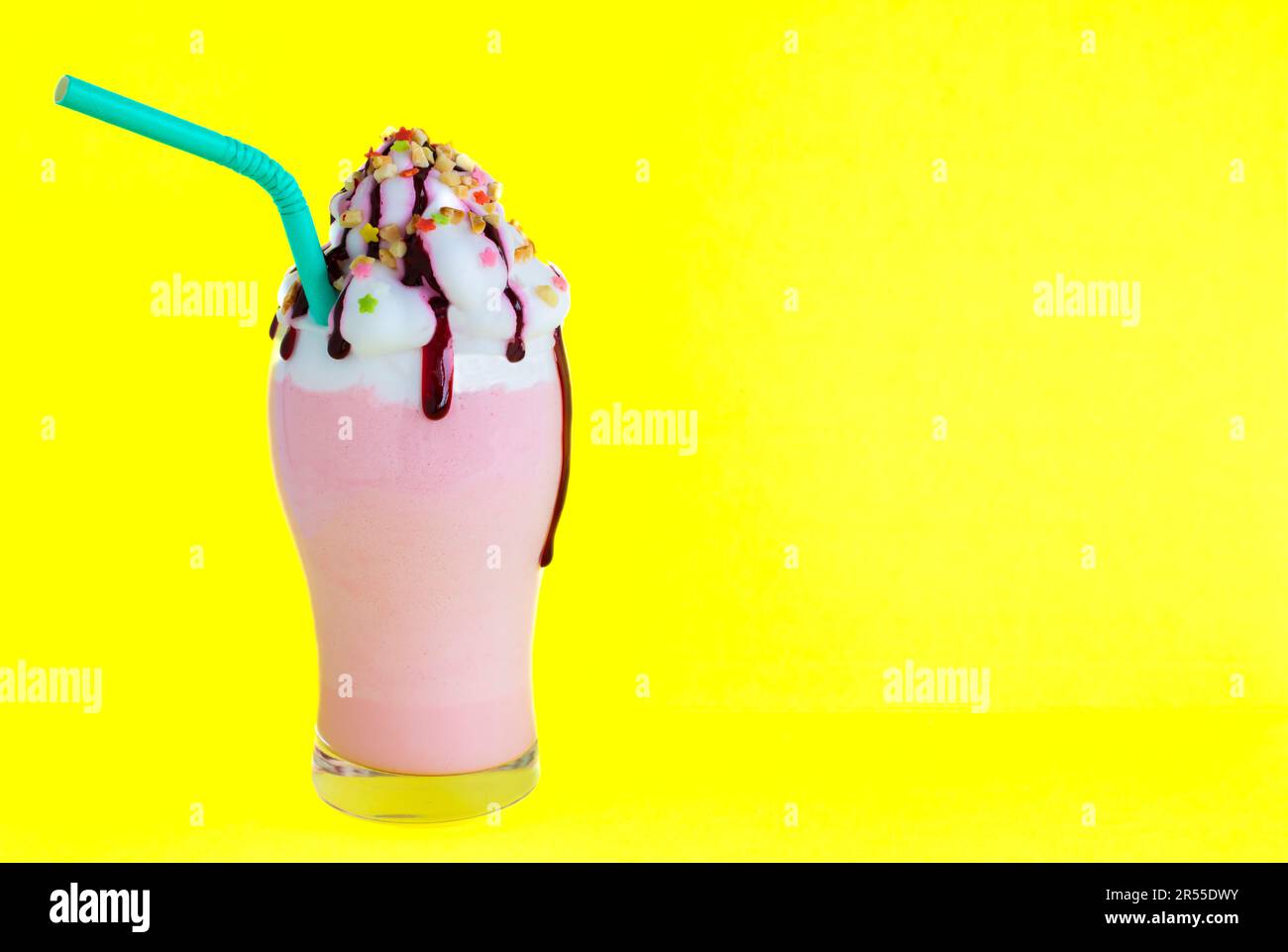 Strawberry milkshake with cream, strawberry syrup, toasted almonds ...