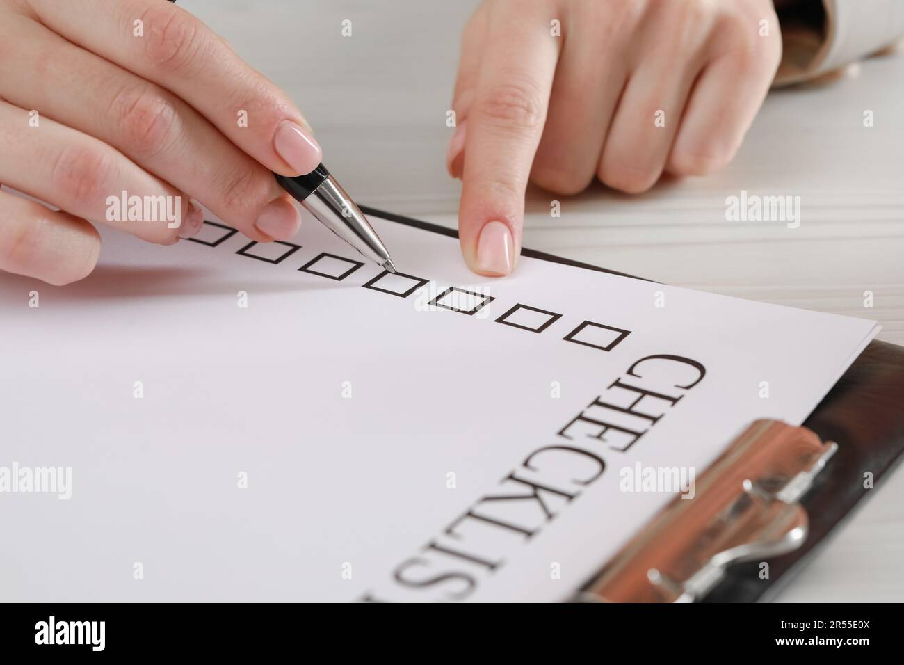 Woman filling audit checklist hi-res stock photography and images - Alamy