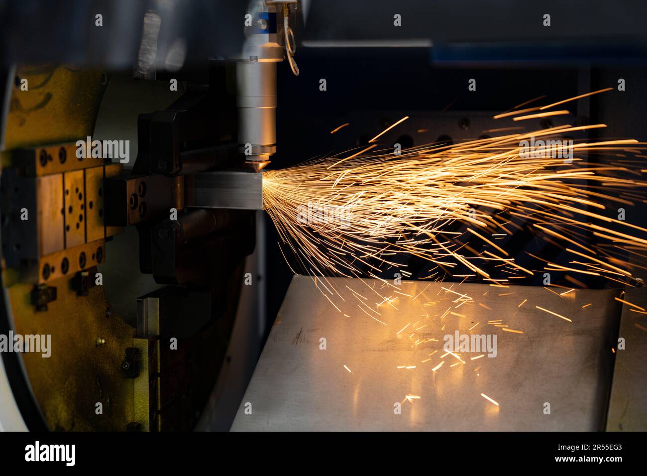 Automatic machine for cutting metal at work. Smart factory. High ...