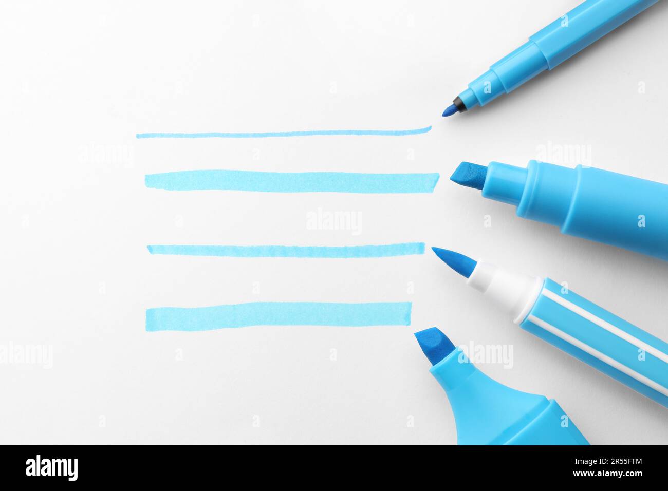 Light blue stripes drawn with markers and highlighters isolated on ...