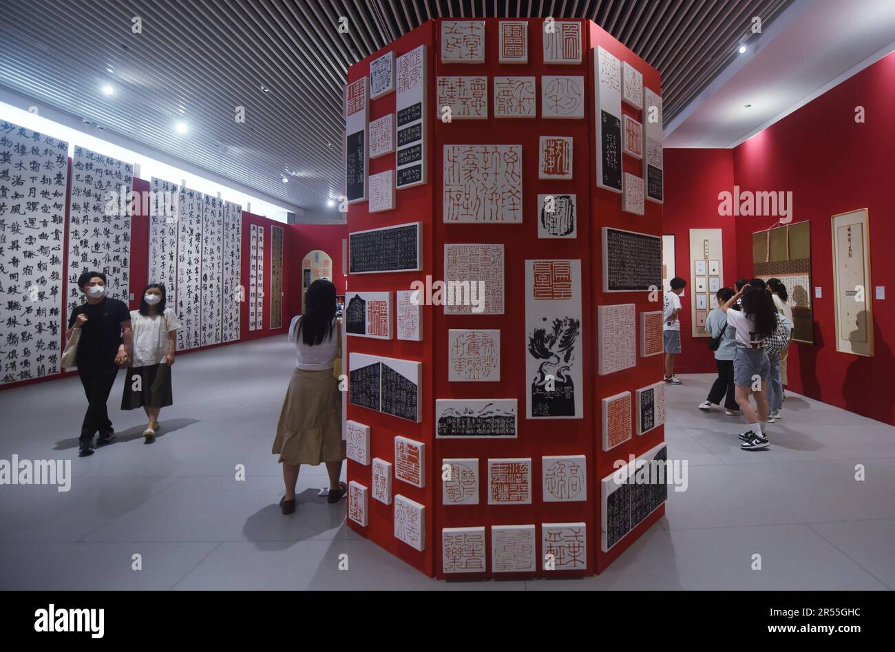 HANGZHOU, CHINA - JUNE 1, 2023 - Visitors view calligraphy and seal ...