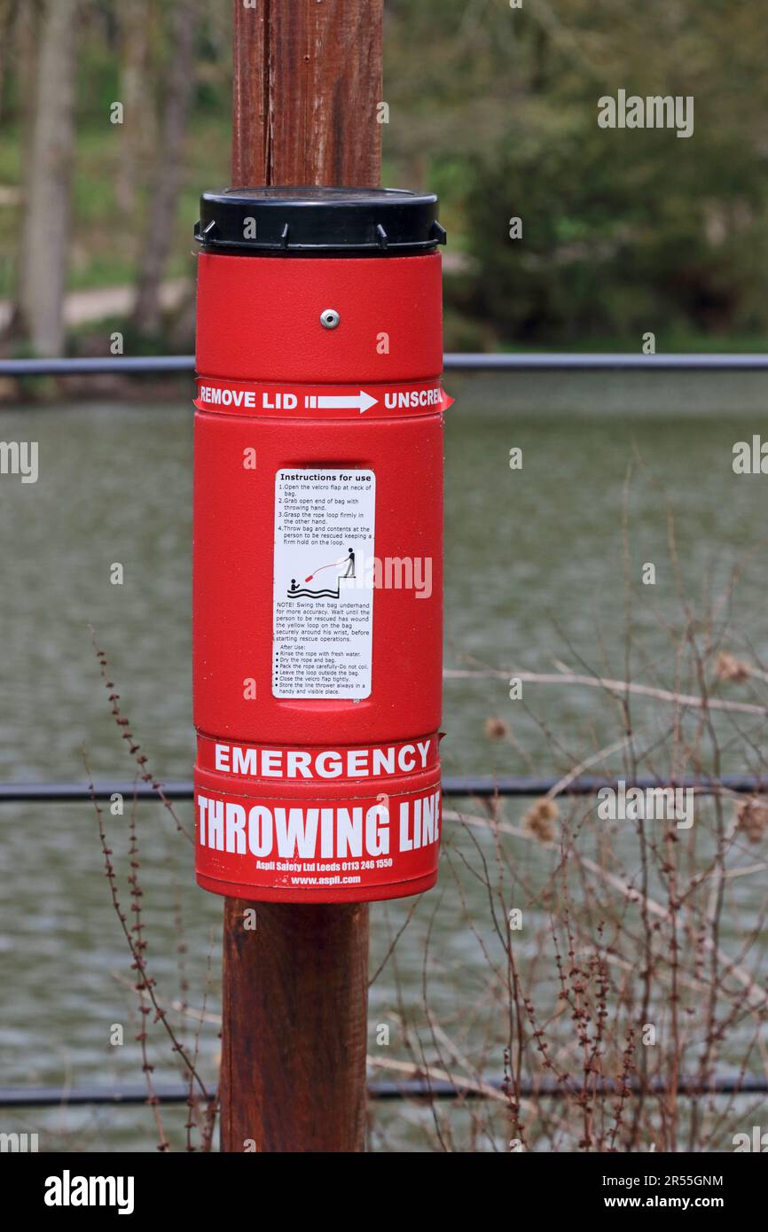 Red box containing Emergency Throwing Line at side of large pond Stock ...
