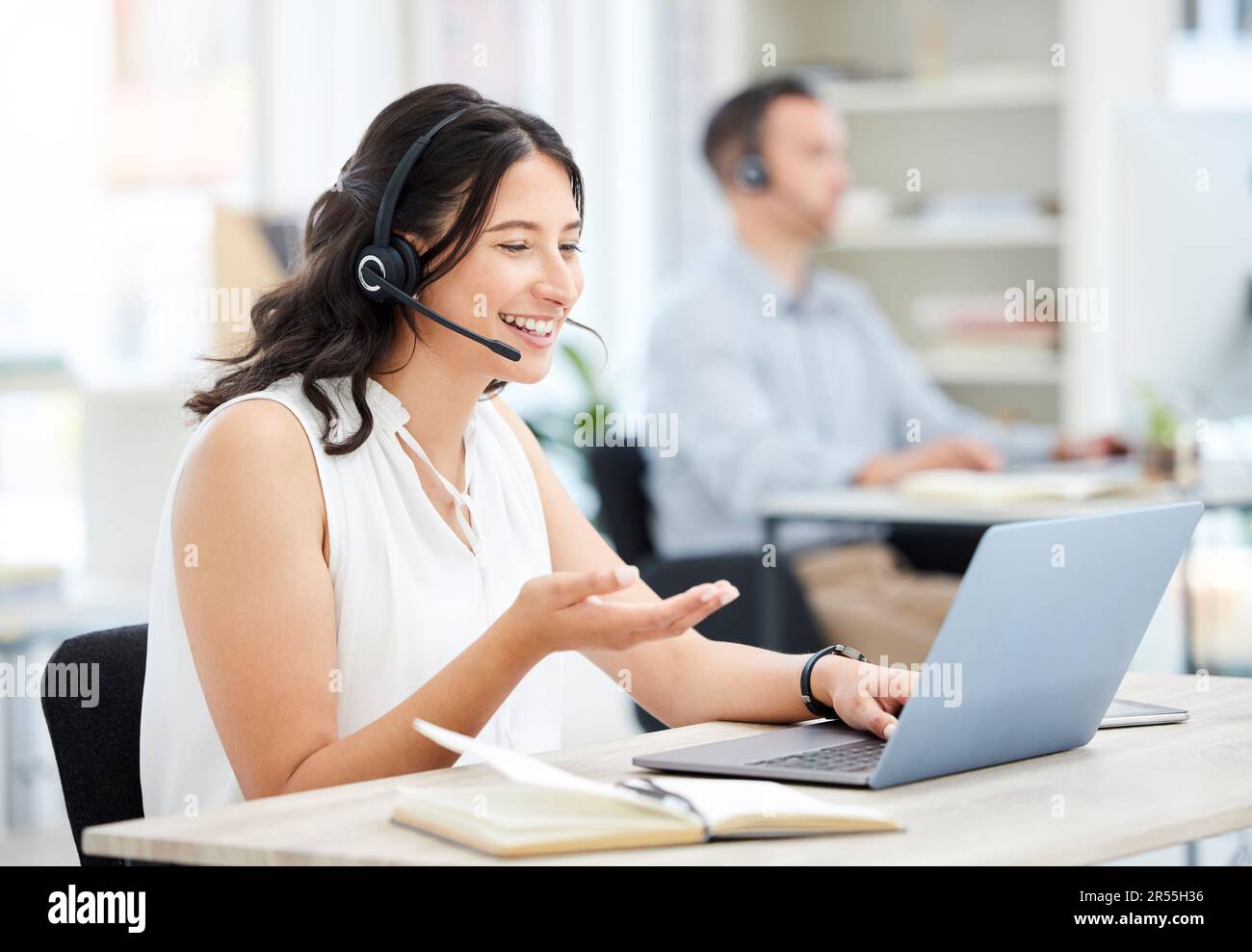 Woman, callcenter and laptop with phone call and smile, happy ...