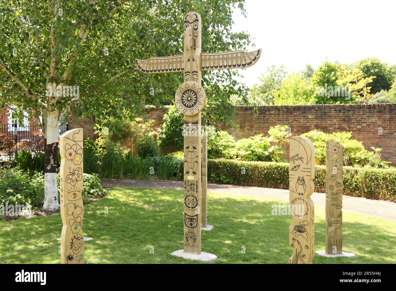 Totem Poles in children's play area within Stoke Park Gardens public ...