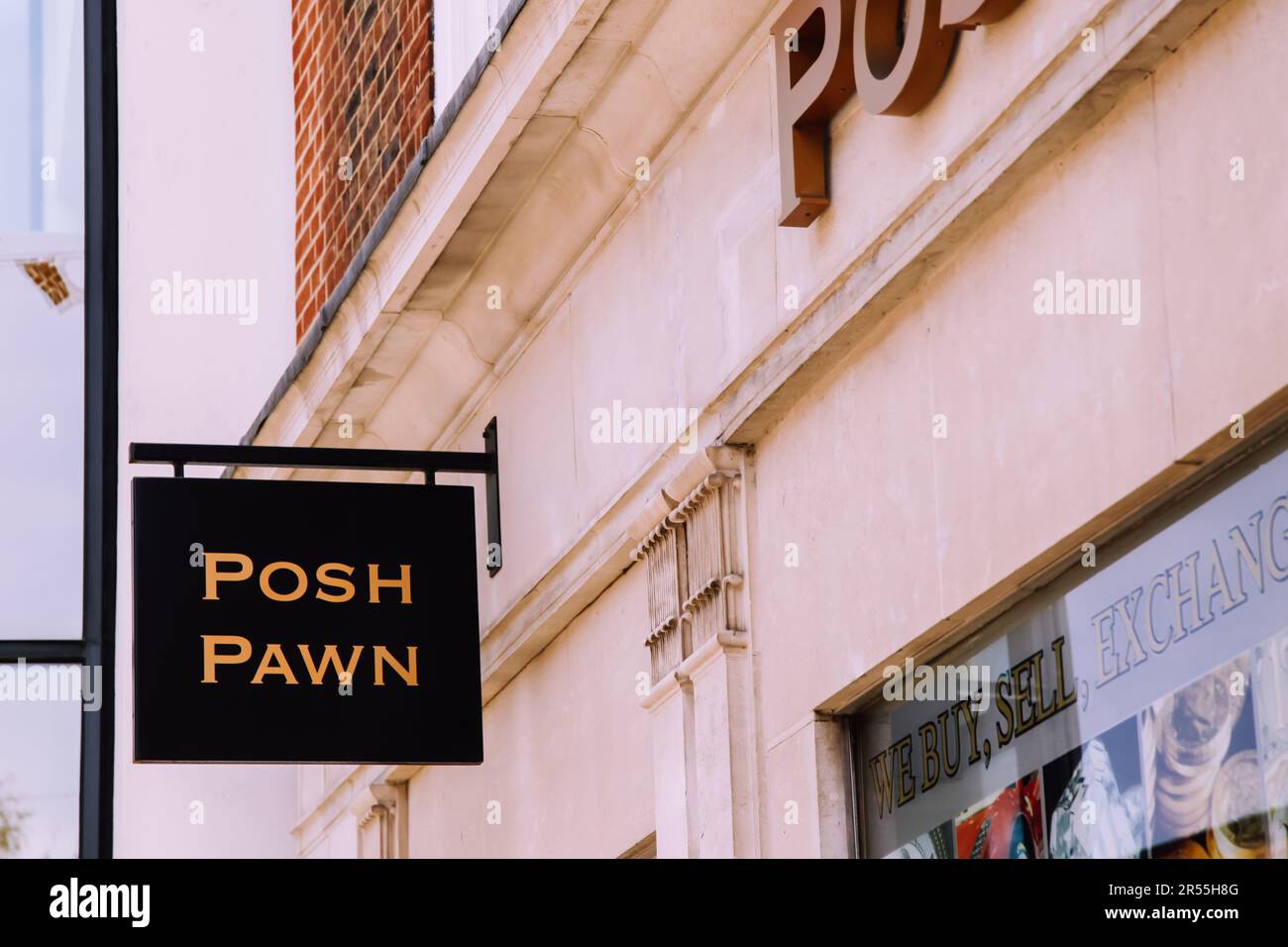 Signage for Posh Pawn shop in Guildford High Street, Surrey, England ...